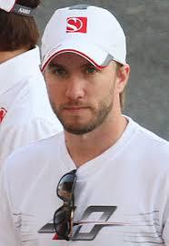 Explain Nick ?, German motor racing driver whose F1 debut was in the ...