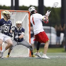 Explain Game played with netted sticks (8) using the Crossword ...